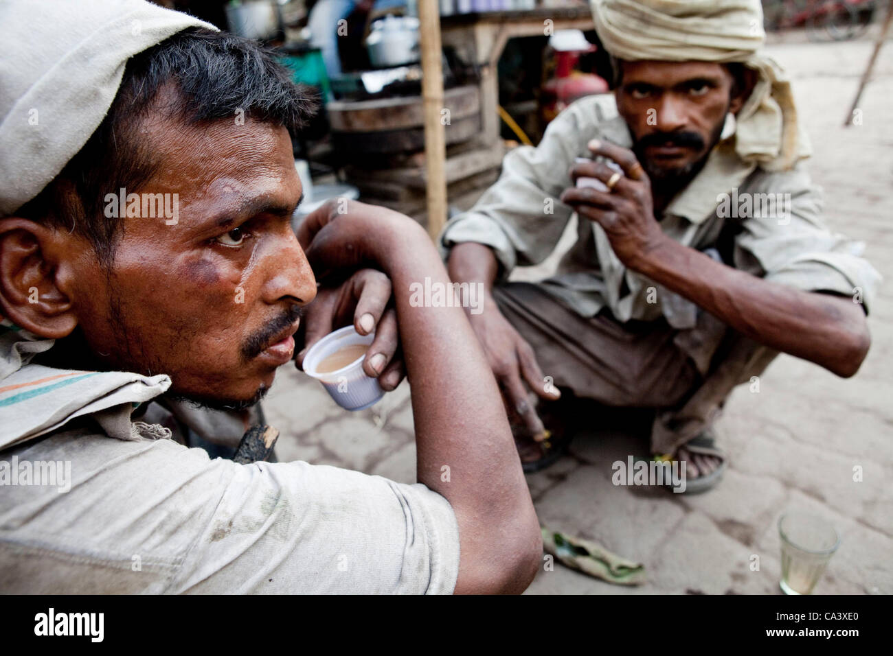 May 22, 2012 - New Delhi, India - Two drug users take a break from ...