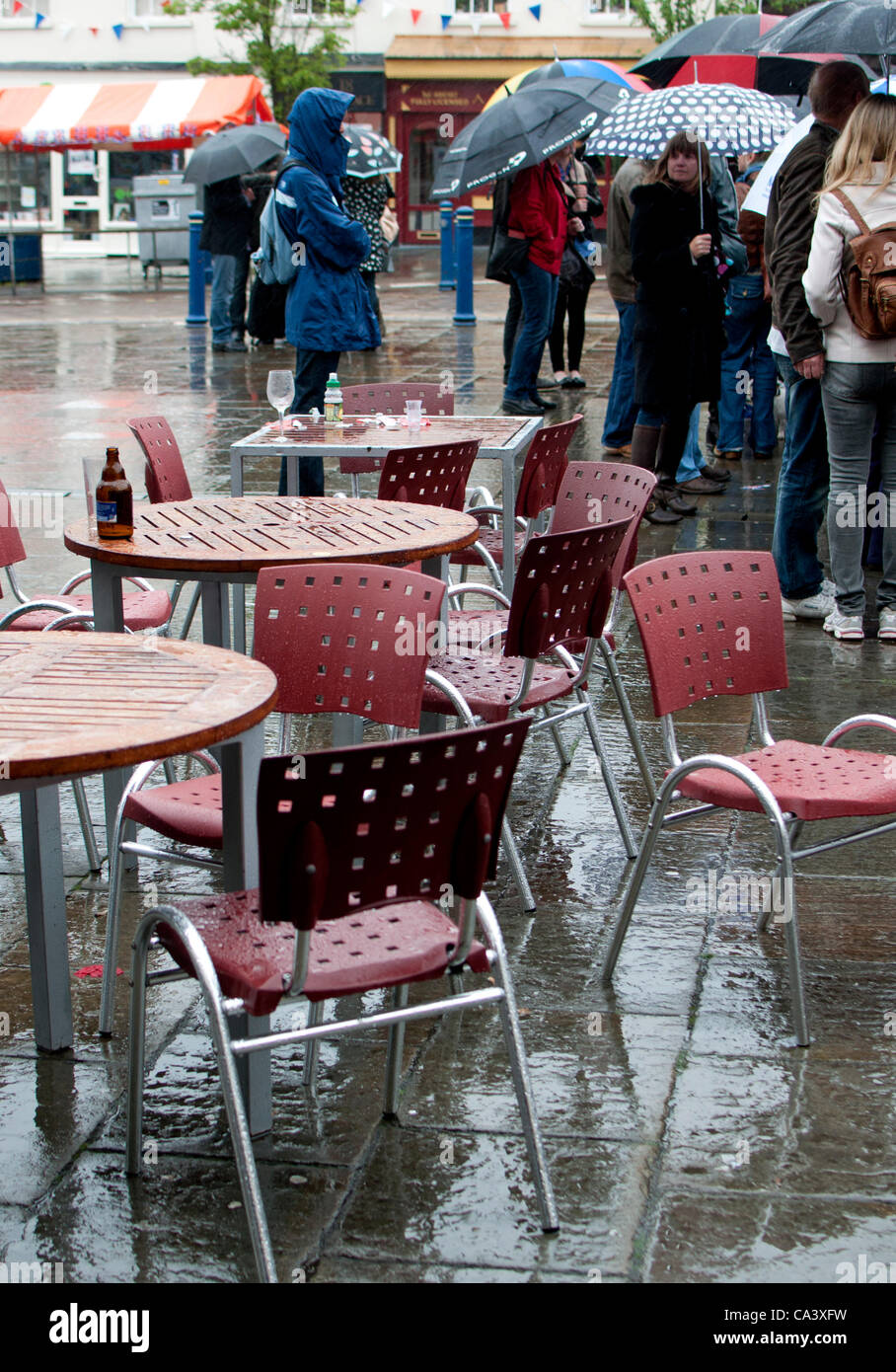 A sparse crowd attend Warwick`s Big Lunch event in a rain-soaked Market ...