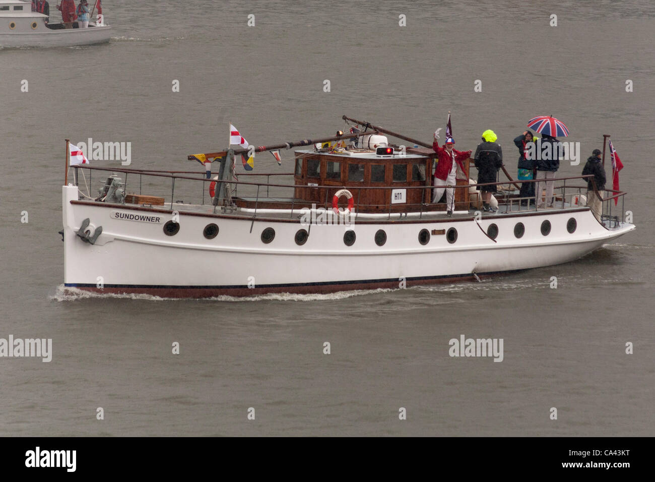 The Sundowner, a Dunkirk Little Ship proceeds along River Thames, as ...