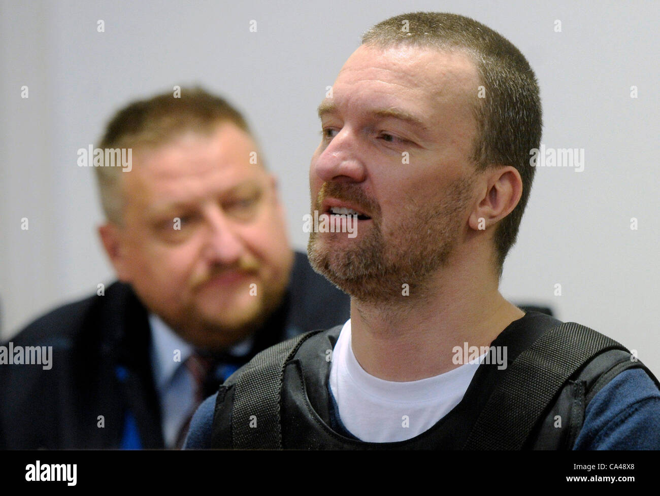 Controversial entrepreneur Tomas Pitr, right, wearing a bulletproof ...