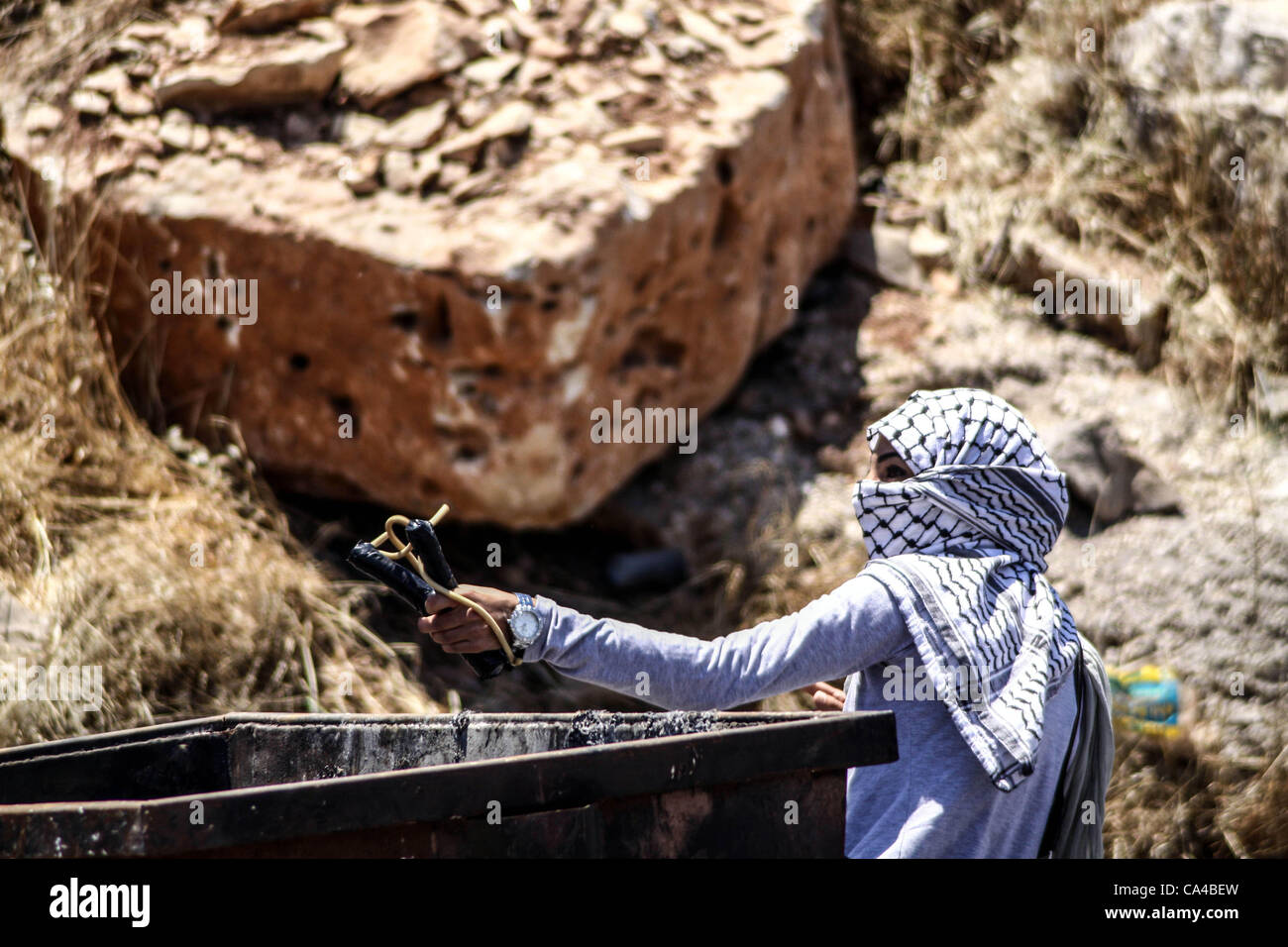 June 5, 2012 - Amman, Amman, Jordan - A Palestinian protester throws ...