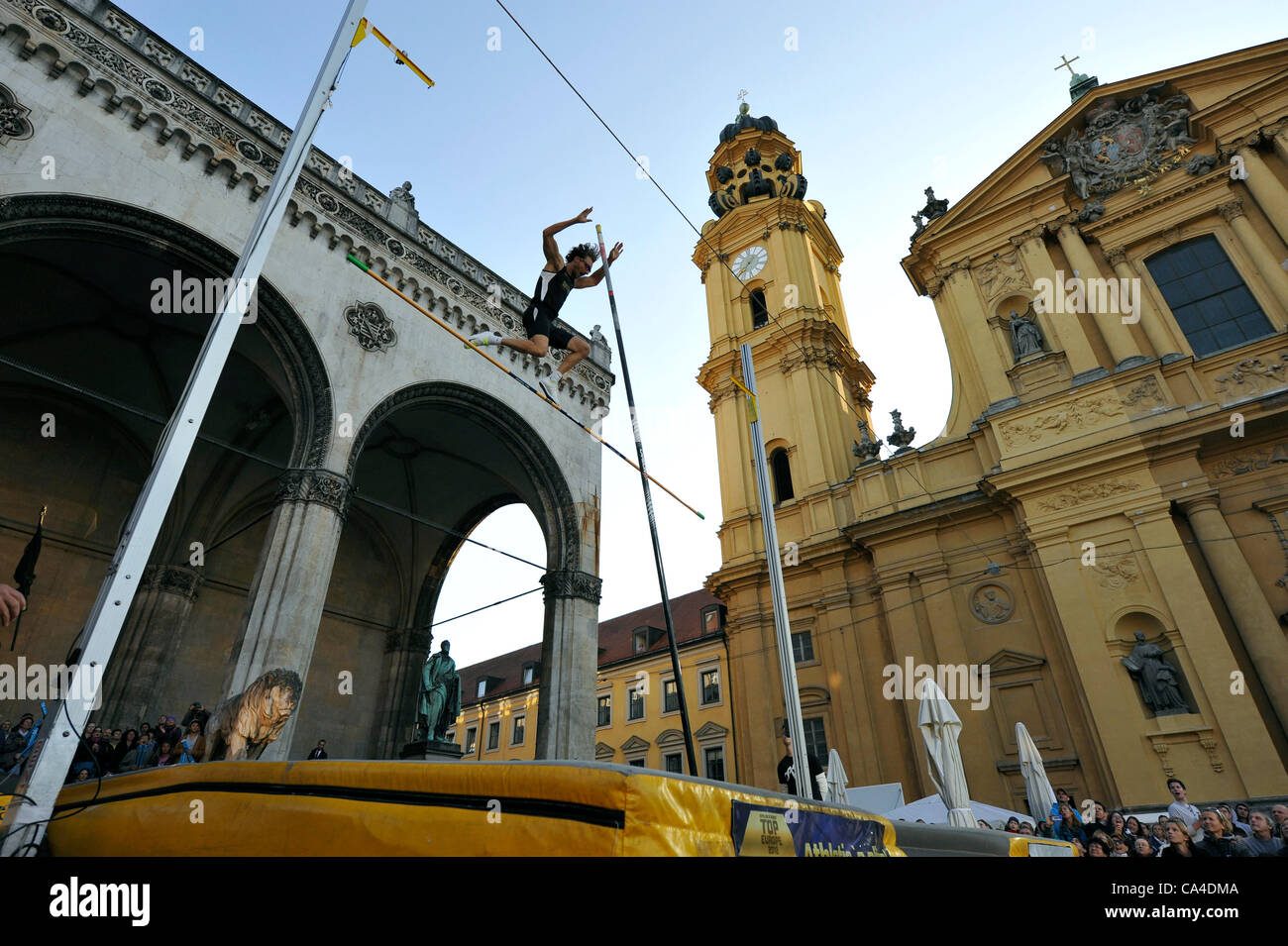Tim Lobinger, German pole vault jumper, knocks down the bar at the Jump ...