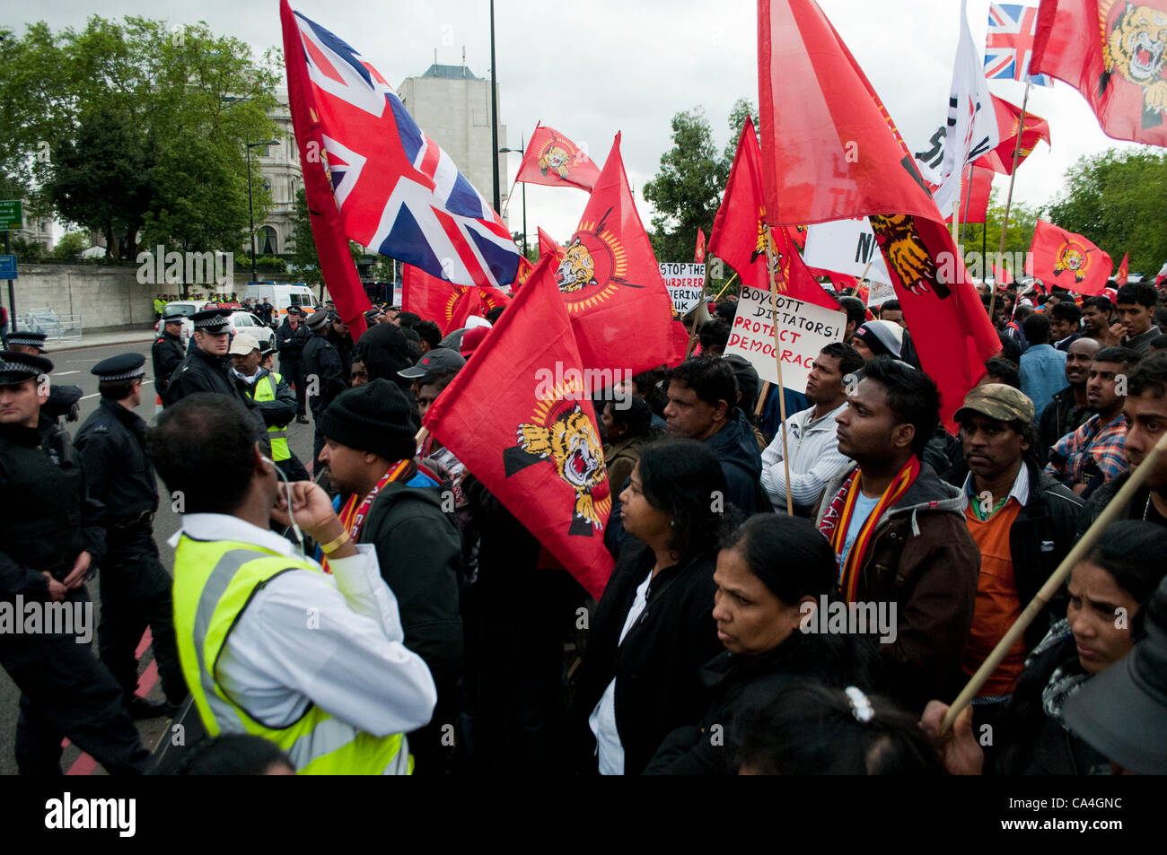 London, UK. 06/06/12. Sri Lankan protesters opposite the Hilton Hotel ...