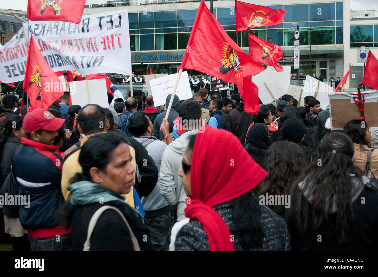 London, UK. 06/06/12. Sri Lankan protesters opposite the Hilton Hotel ...