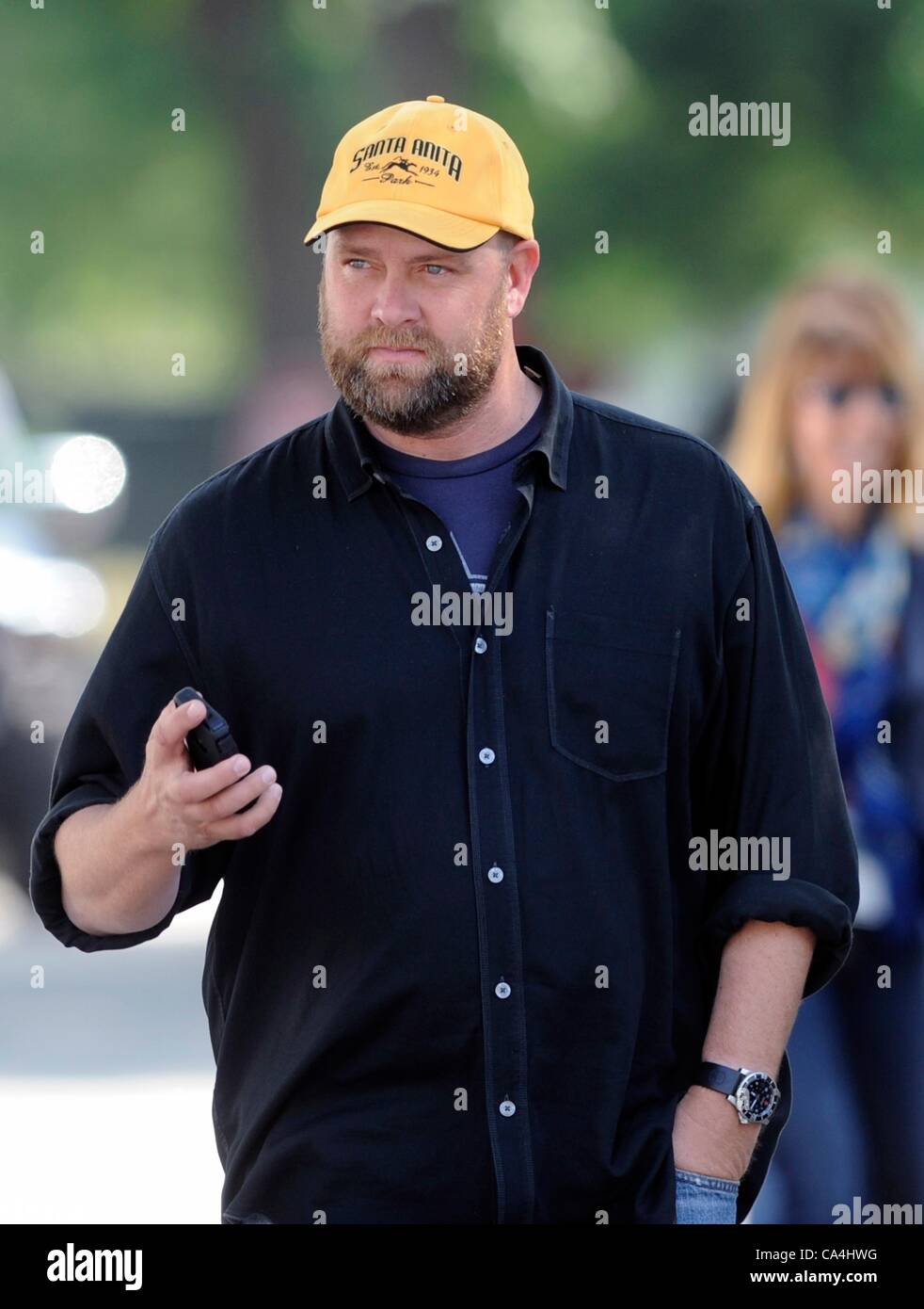 June 6, 2012 - Elmont, New York, U.S. - Trainer DOUG O'NEILL walks to ...