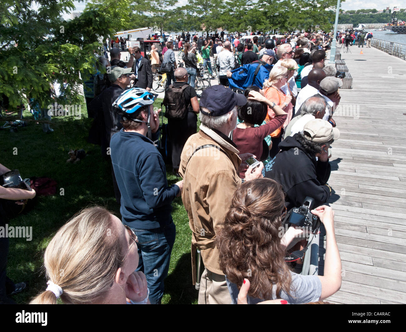 crowd on Pier 84 south of Intrepid berth waiting to welcome space ...