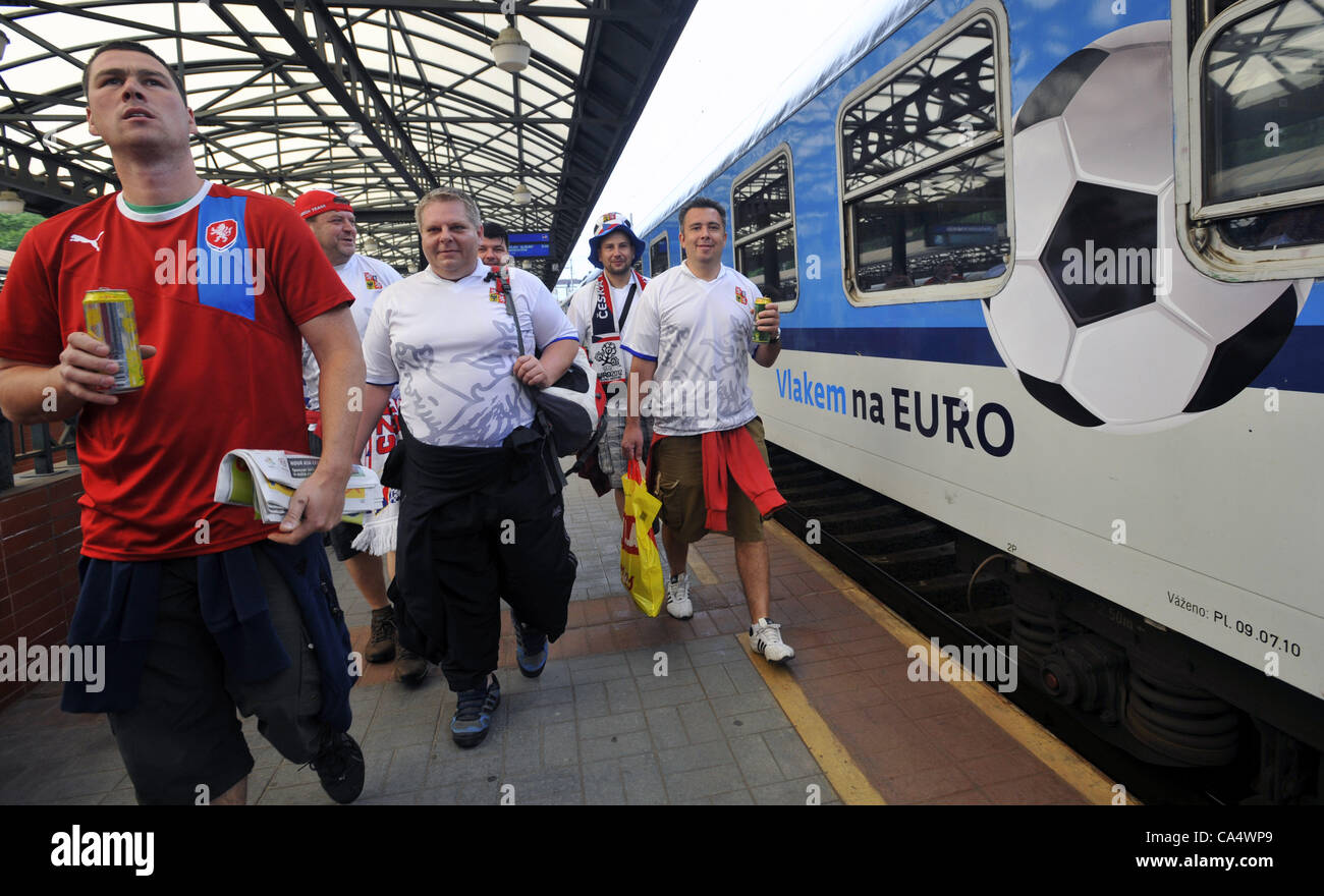Prague, Czech Republic. 08/06/2012. Czech football fans walk by a train ...