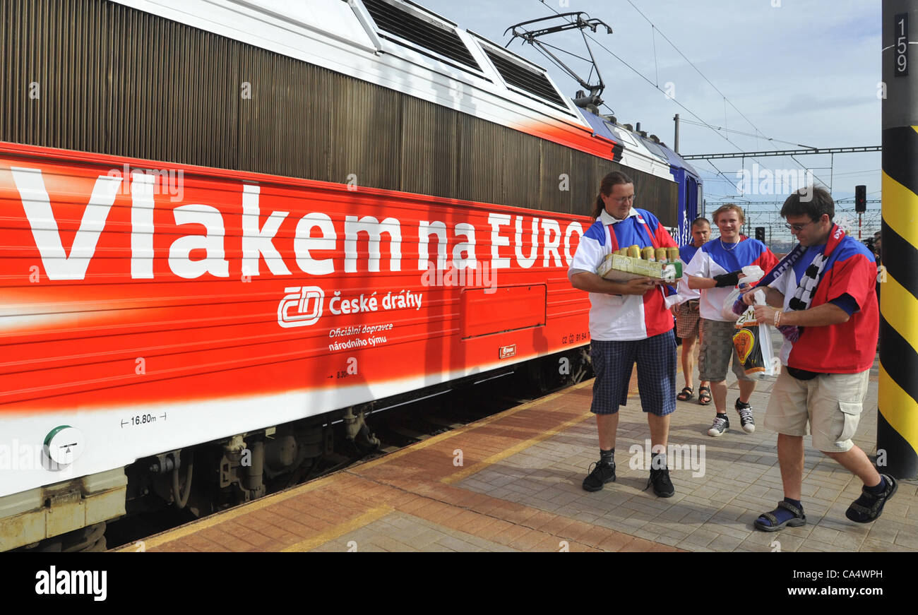 Prague, Czech Republic. 08/06/2012. Czech football fans walk by a train ...