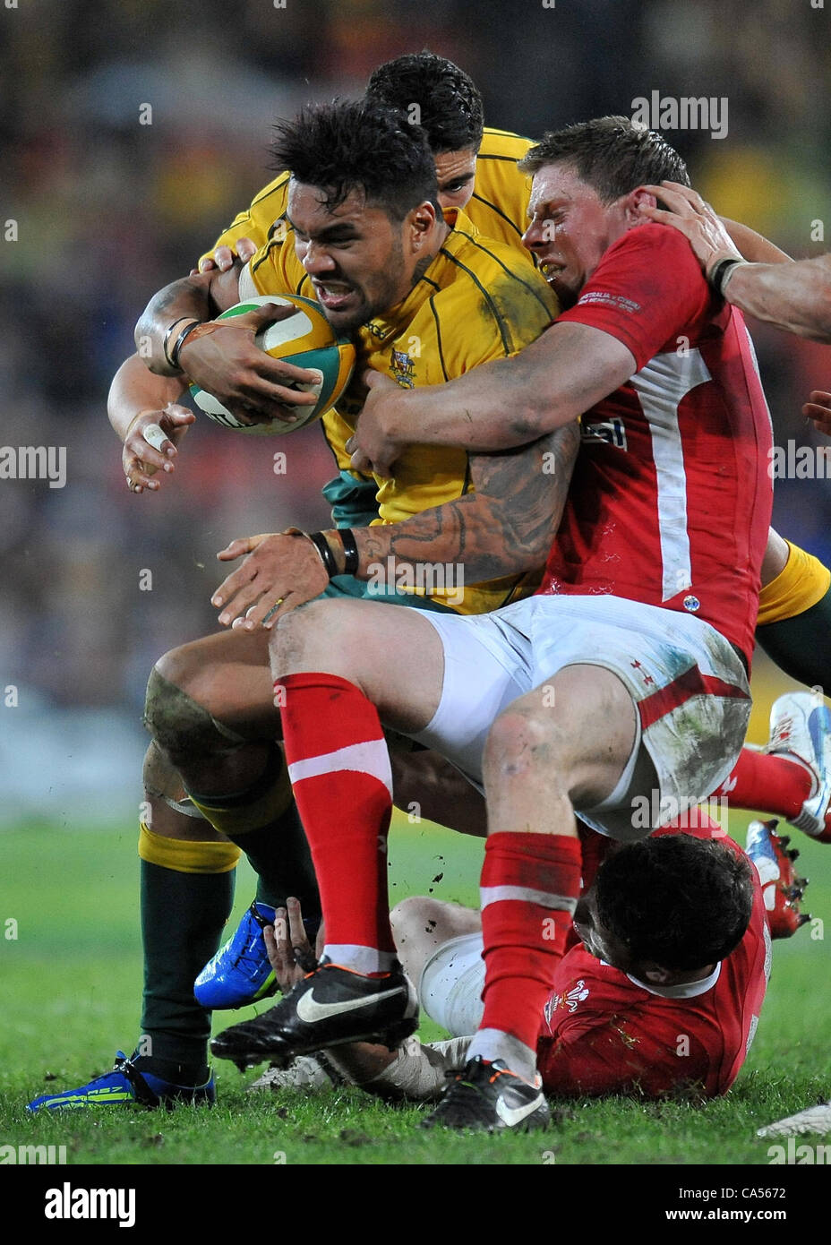 09.06.2012 Brisbane, Australia. Digby Ioane charges into the Welsh ...