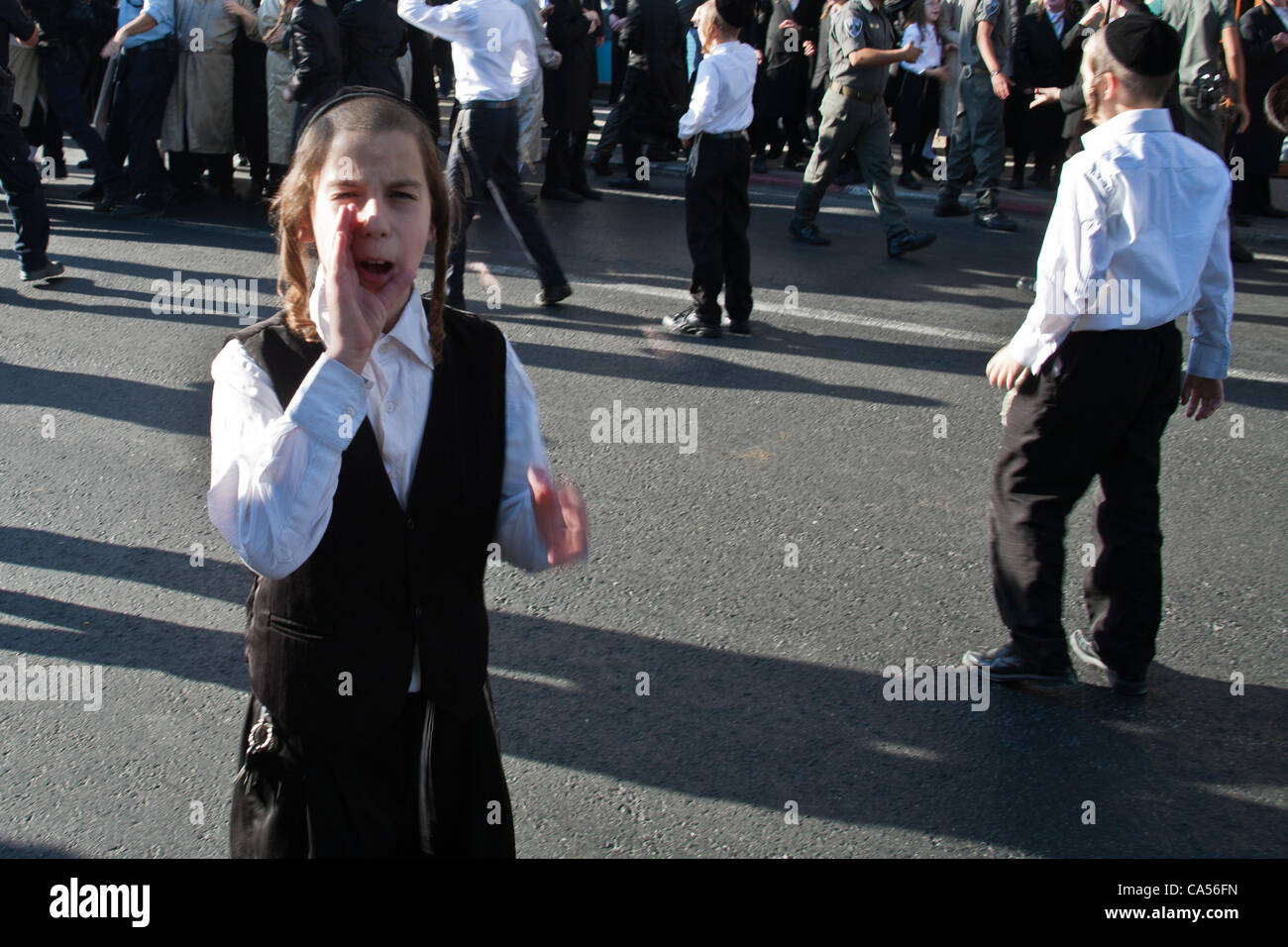 A young ultra-Orthodox Haredi boy shouts “Shabess” at this photographer ...