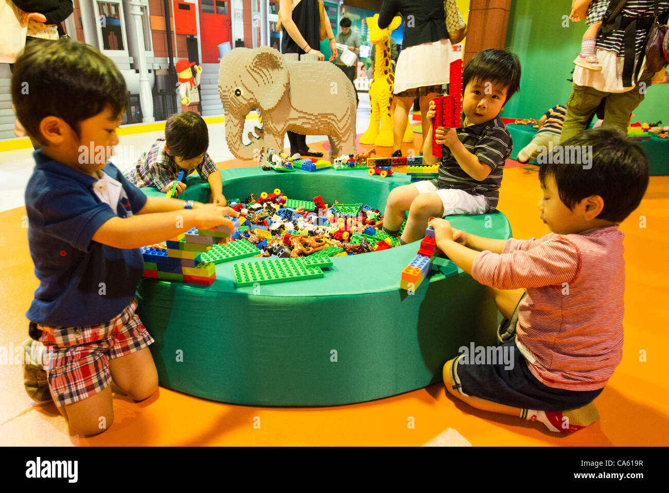 June 14, 2012, Tokyo, Japan - Kids play with various LEGO toys during a ...