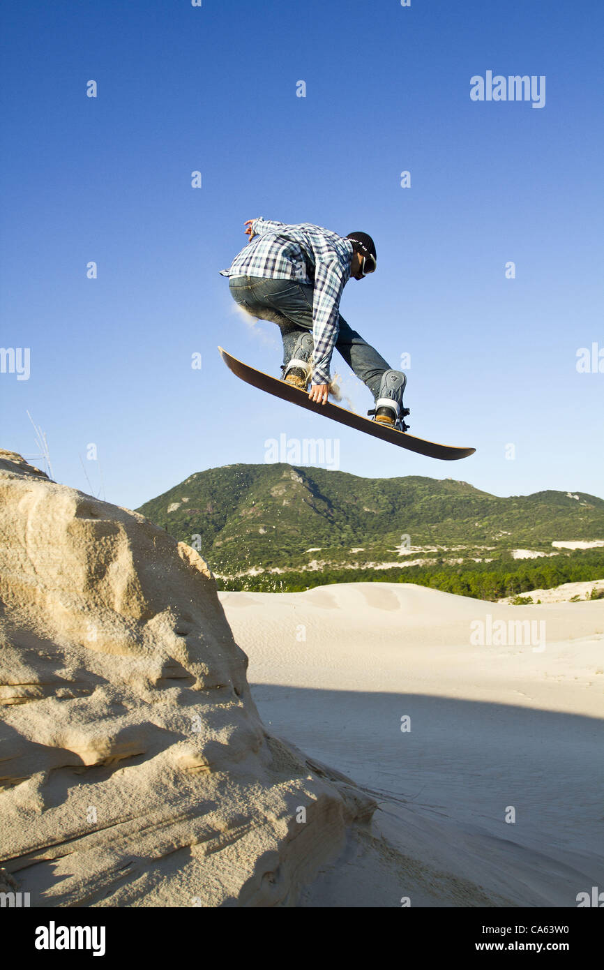 June 12, 2012 - Florianopolis, Santa Catarina, Brazil - Sandboarding on ...