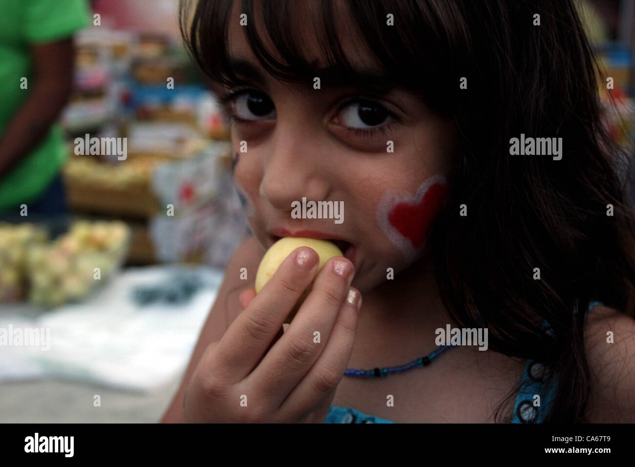 June 15, 2012 - Ramallah, West Bank - A Palestinian girl takes part in ...