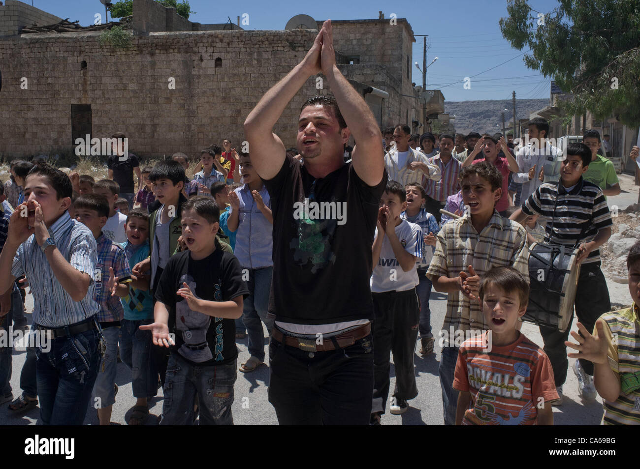 Young Syrian boys protest in the streets of (undisclosed location) in ...