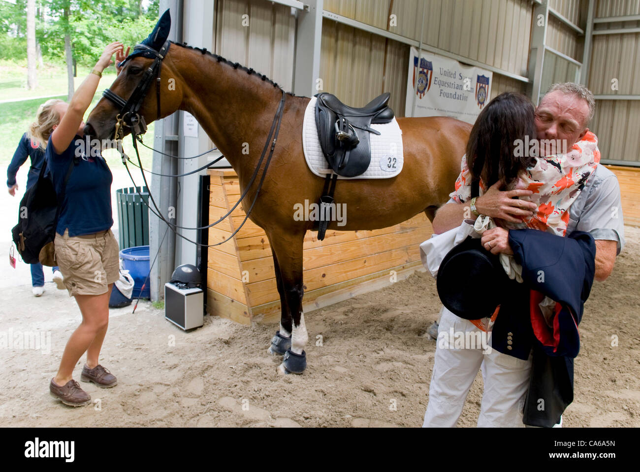 June 15, 2012 - Gladstone, NJ, USA - Trainer Jan Ebeling hugs his wife ...