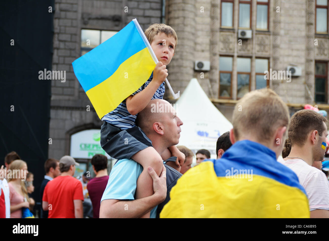KIEV, UKRAINE - JUNE 15: Ukrainian fans in the fan zone in Kiev watch ...