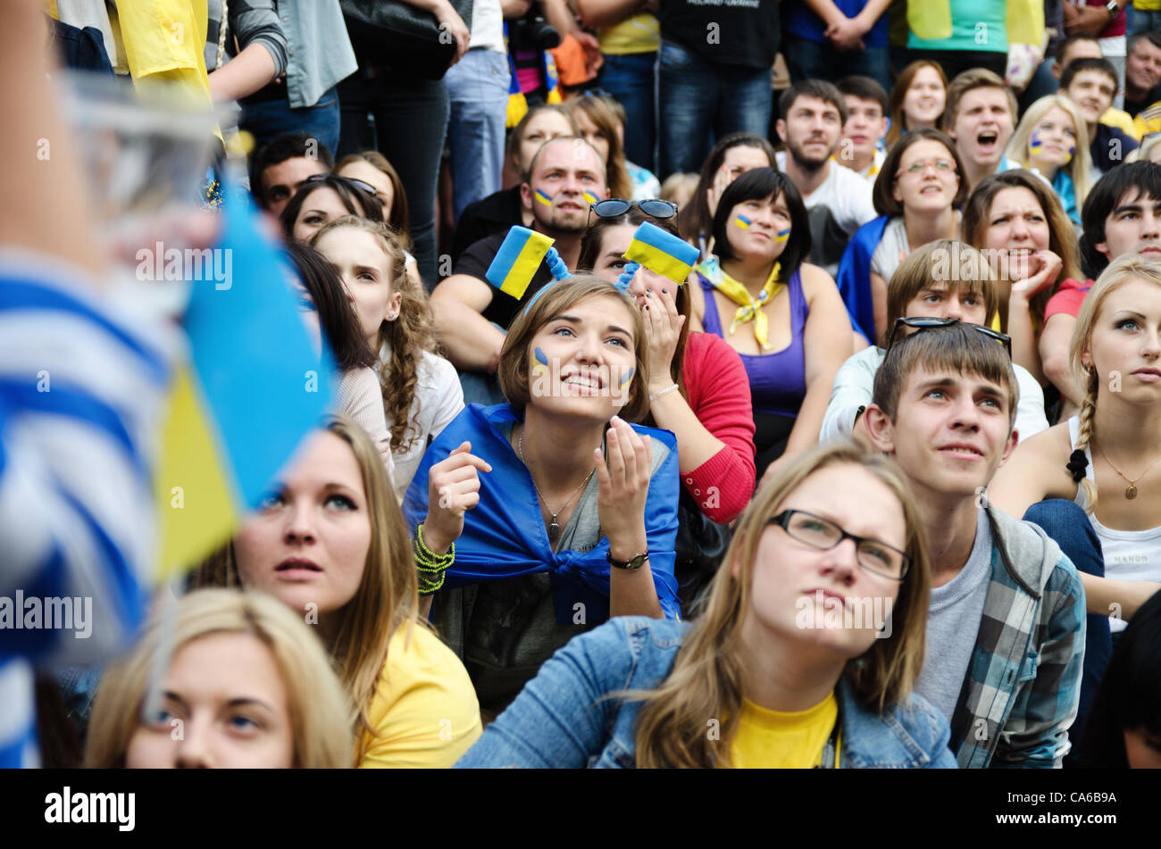 KIEV, UKRAINE - JUNE 15: Ukrainian fans in the fan zone in Kiev watch ...