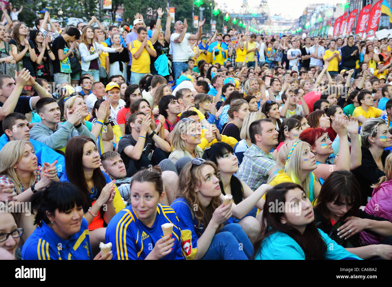 KIEV, UKRAINE - JUNE 15: Ukrainian fans in the fan zone in Kiev watch ...