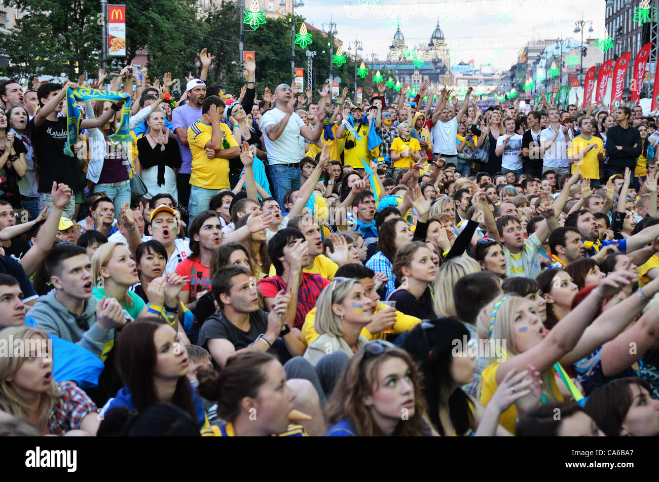 KIEV, UKRAINE - JUNE 15: Ukrainian fans in the fan zone in Kiev watch ...