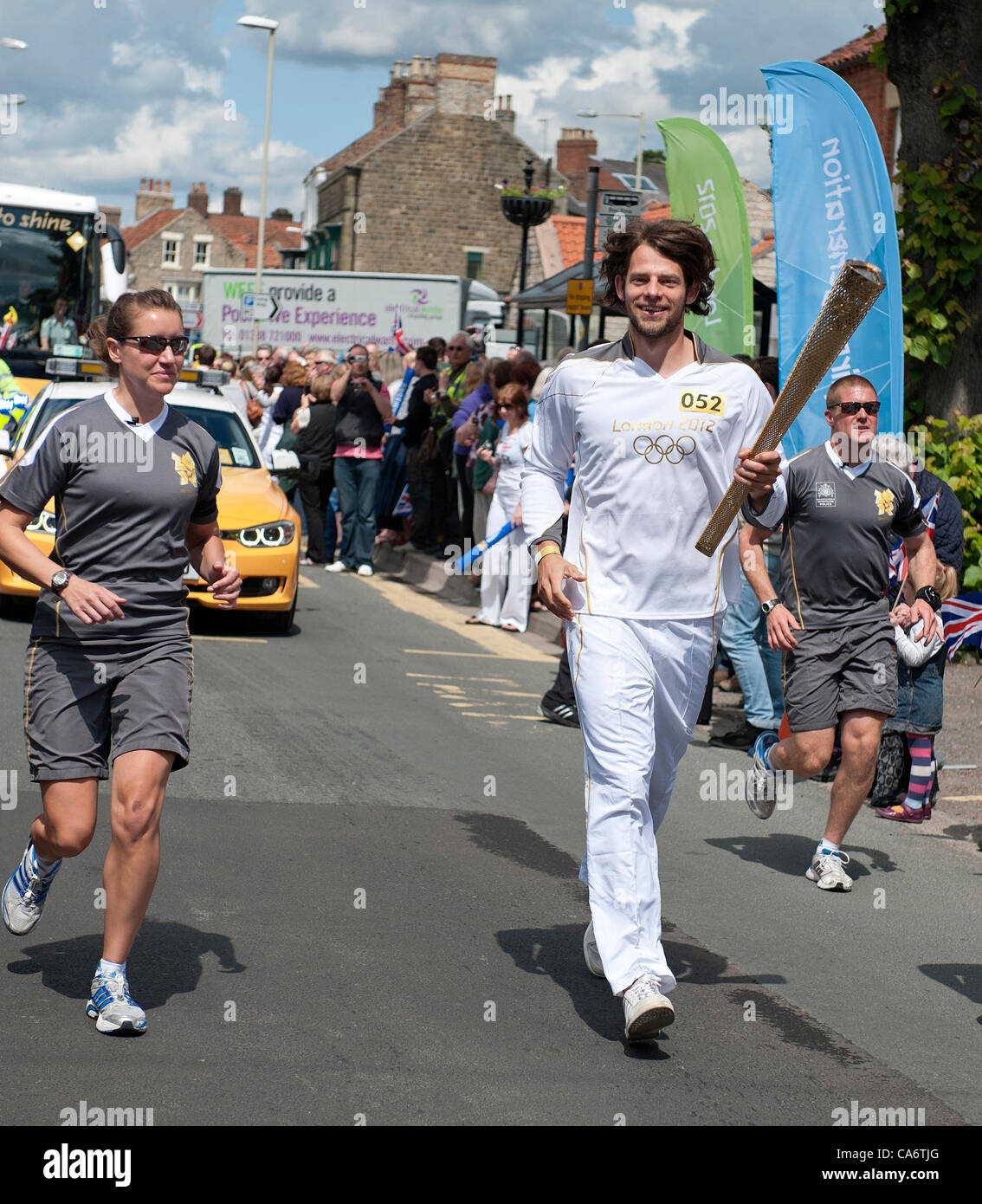 Pickering, UK. Monday 18th June2012. Tom Ransley carries the Olympic ...