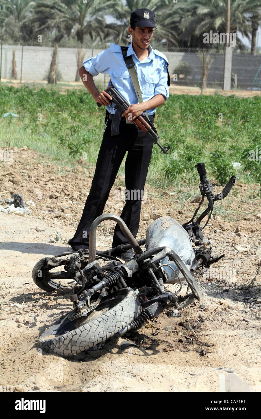 June 19, 2012 - Dir al-Balah, Gaza Strip - A Hamas policeman looks at a ...
