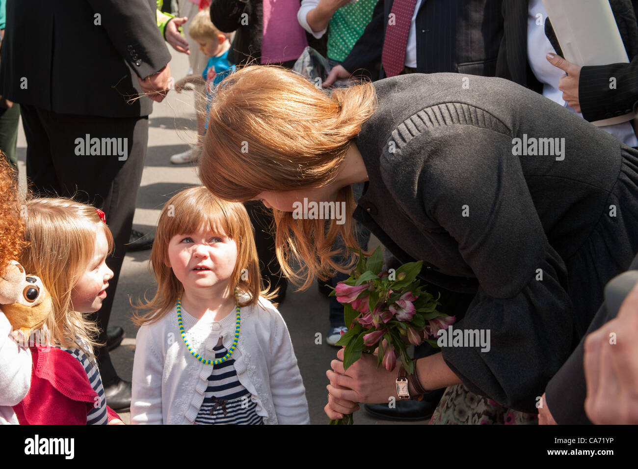 Princess Beatrice (member of the royal family) is holding a bunch of ...