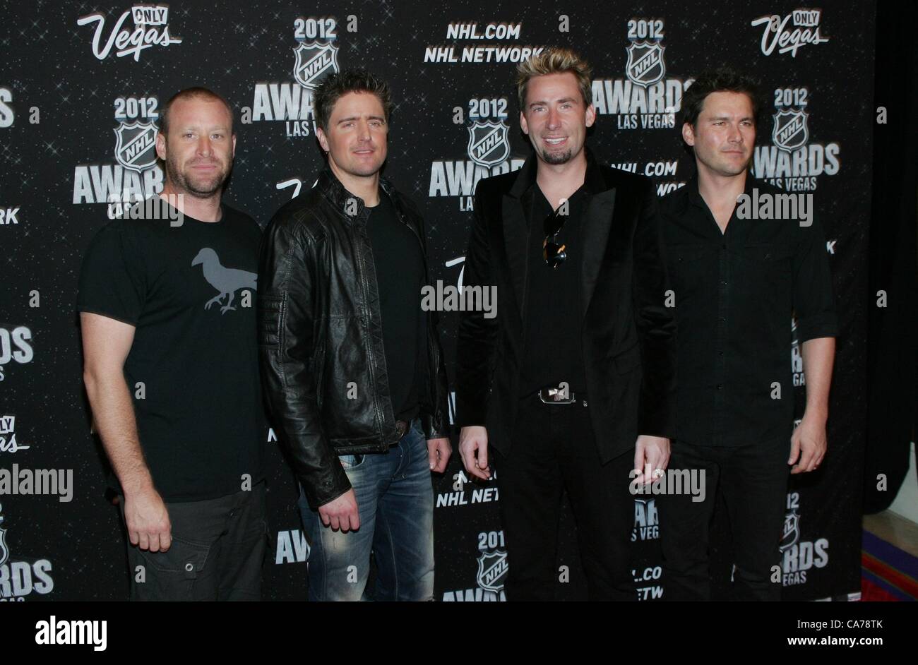 Mike Kroeger, Daniel Adair, Chad Kroeger and Ryan Peake of Nickelback ...