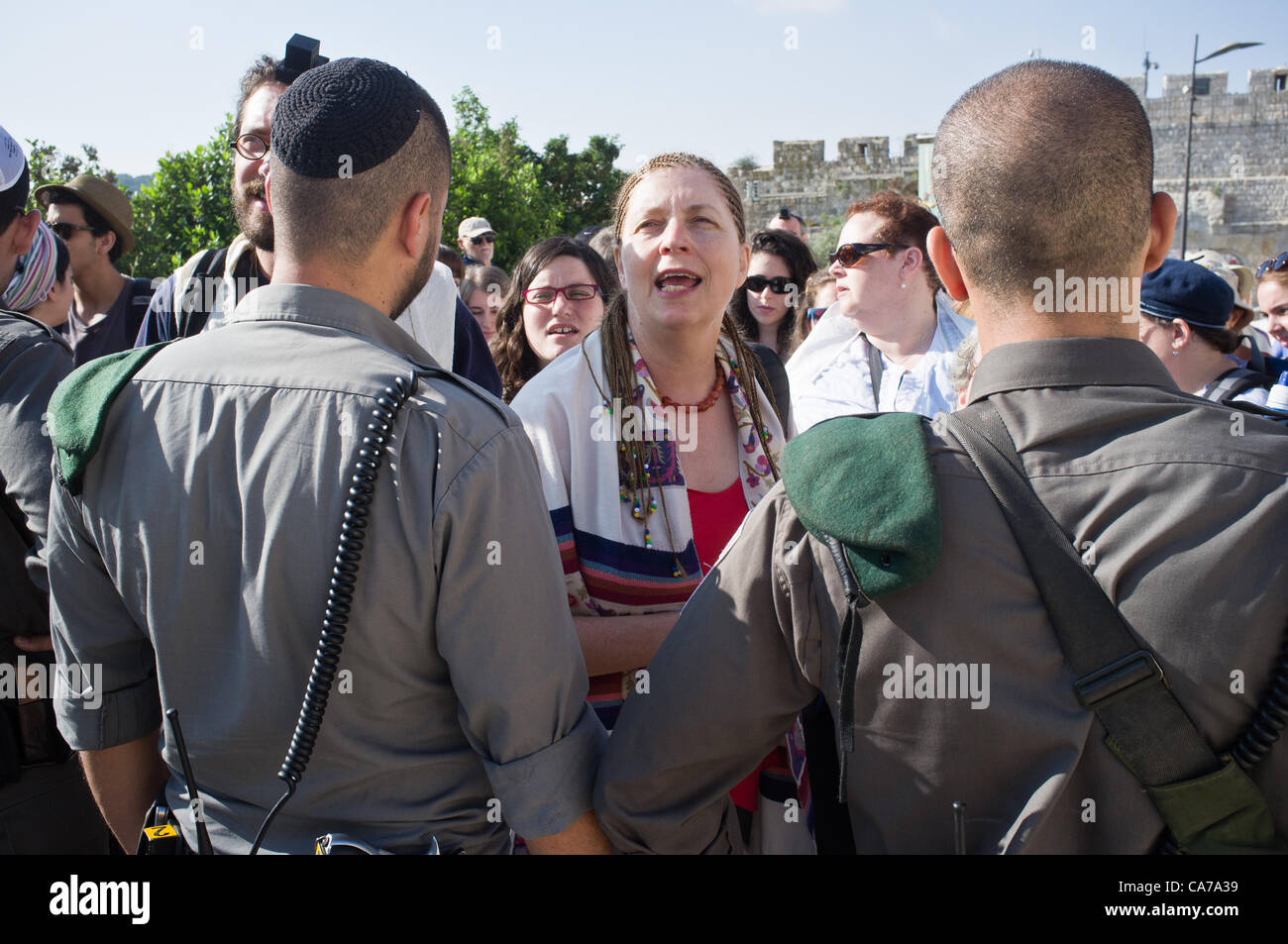 Border Police block advancement of Chairwoman Anat Hoffman (C) and ...