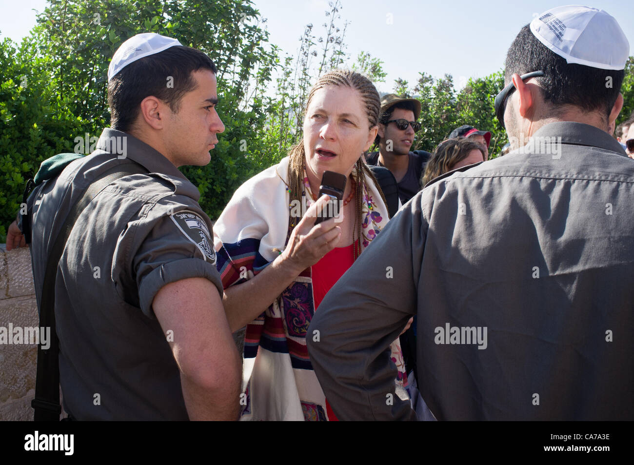 Border Police block advancement of Chairwoman Anat Hoffman (C) and ...