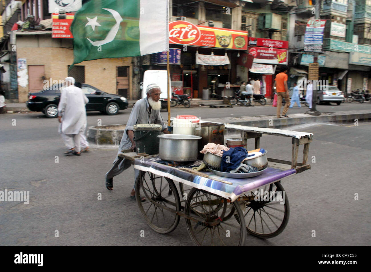 An Aged man sells food item earn his livelihood for support his family ...