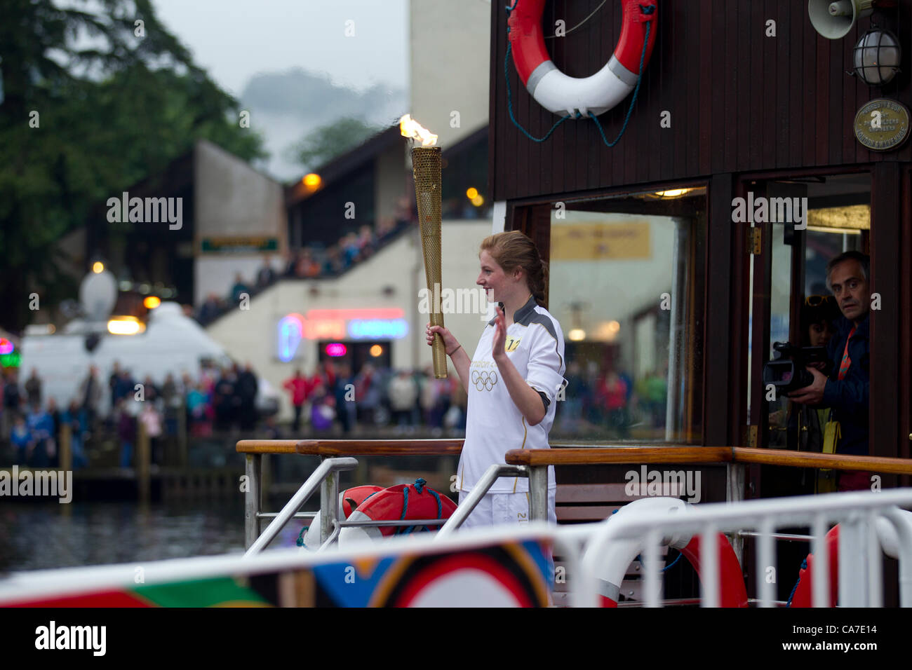 Stephanie Booth with Olympic torch on the steam cruiser The Tern on ...