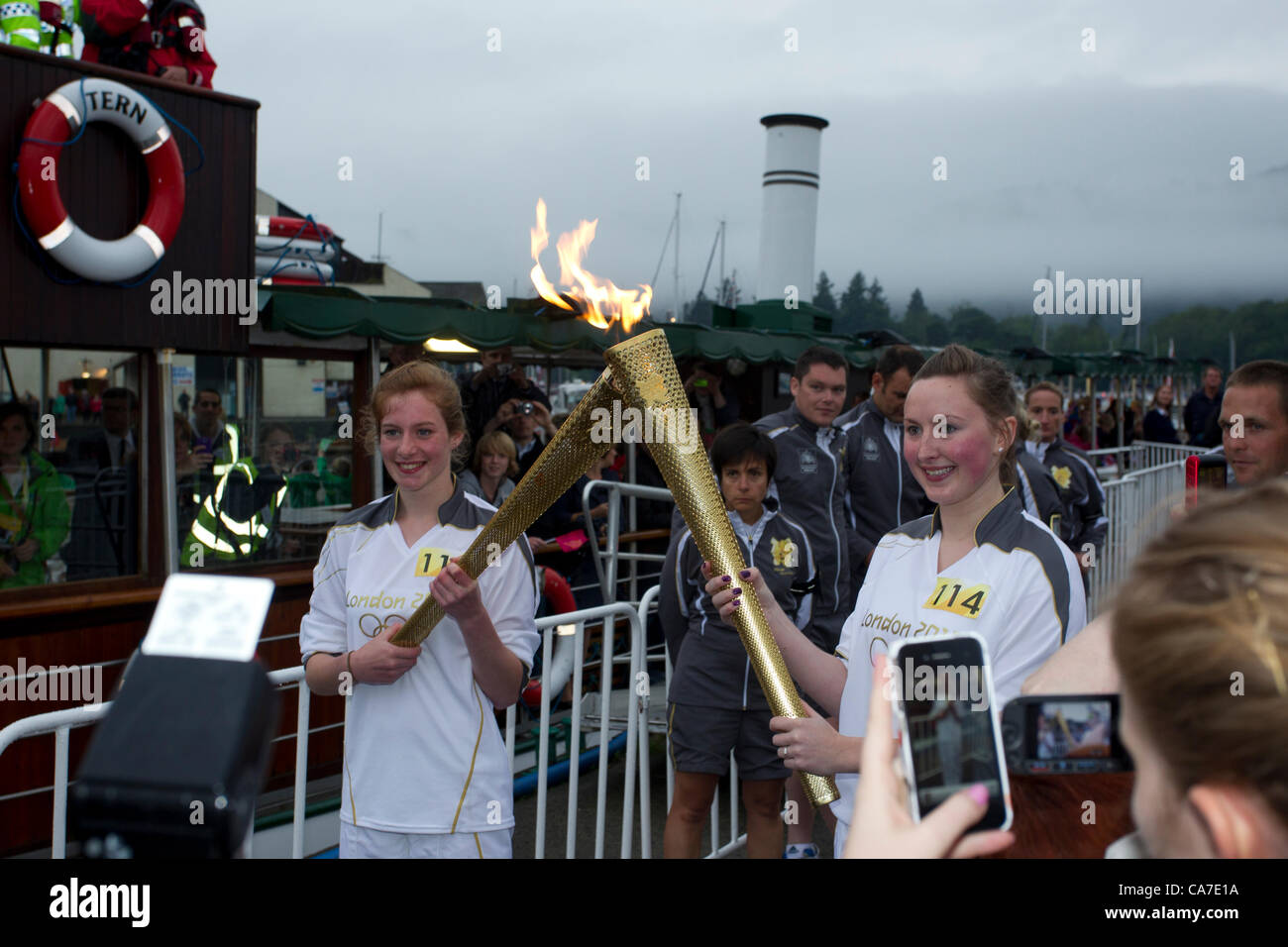 Stephanie Booth And Jan Booth with Olympic torch steam cruiser The Tern ...