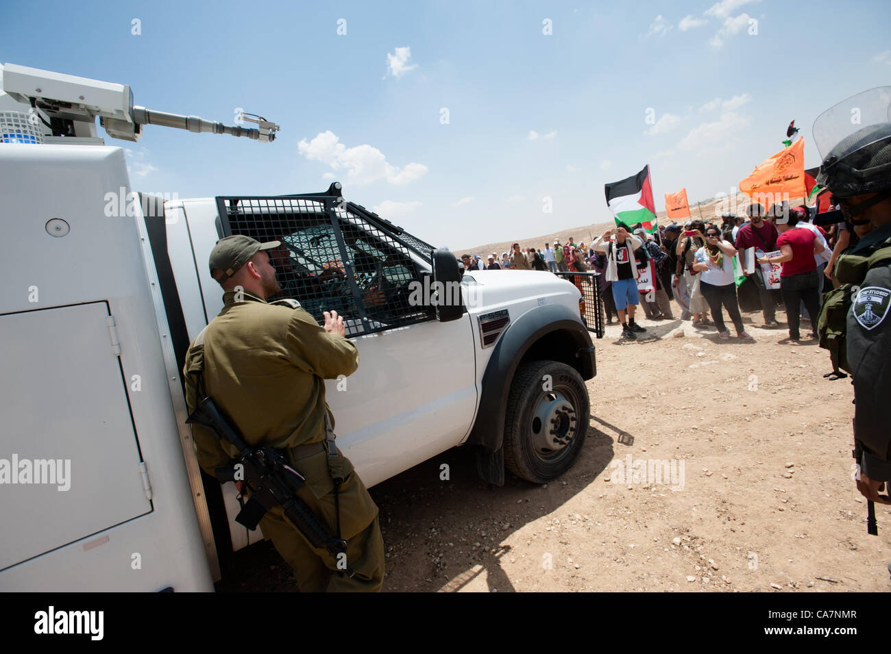 SUSYA, PALESTINIAN TERRITORIES - JUNE 22: Israeli soldiers use a "skunk ...
