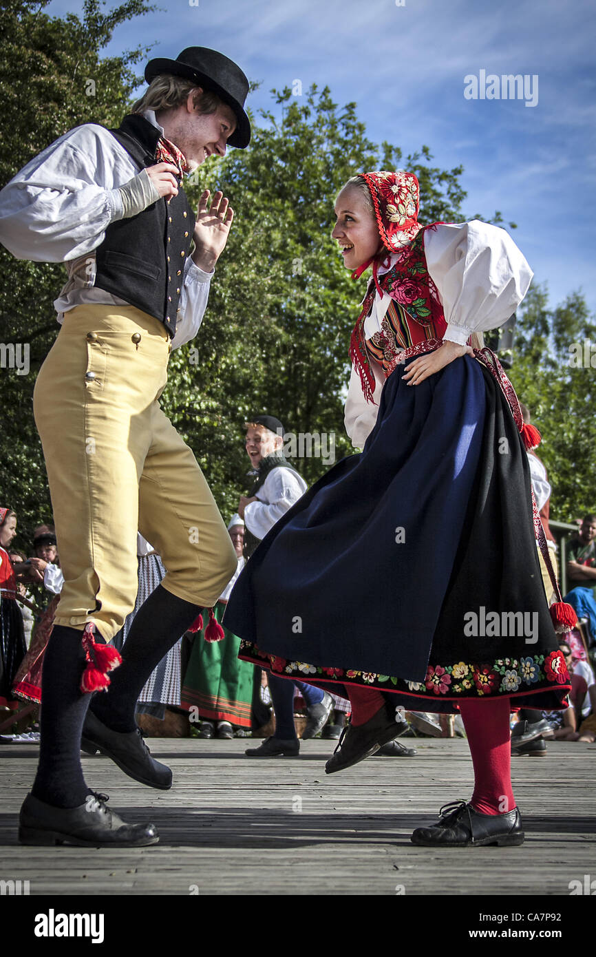 Dance around maypole traditional costume hi-res stock photography and ...