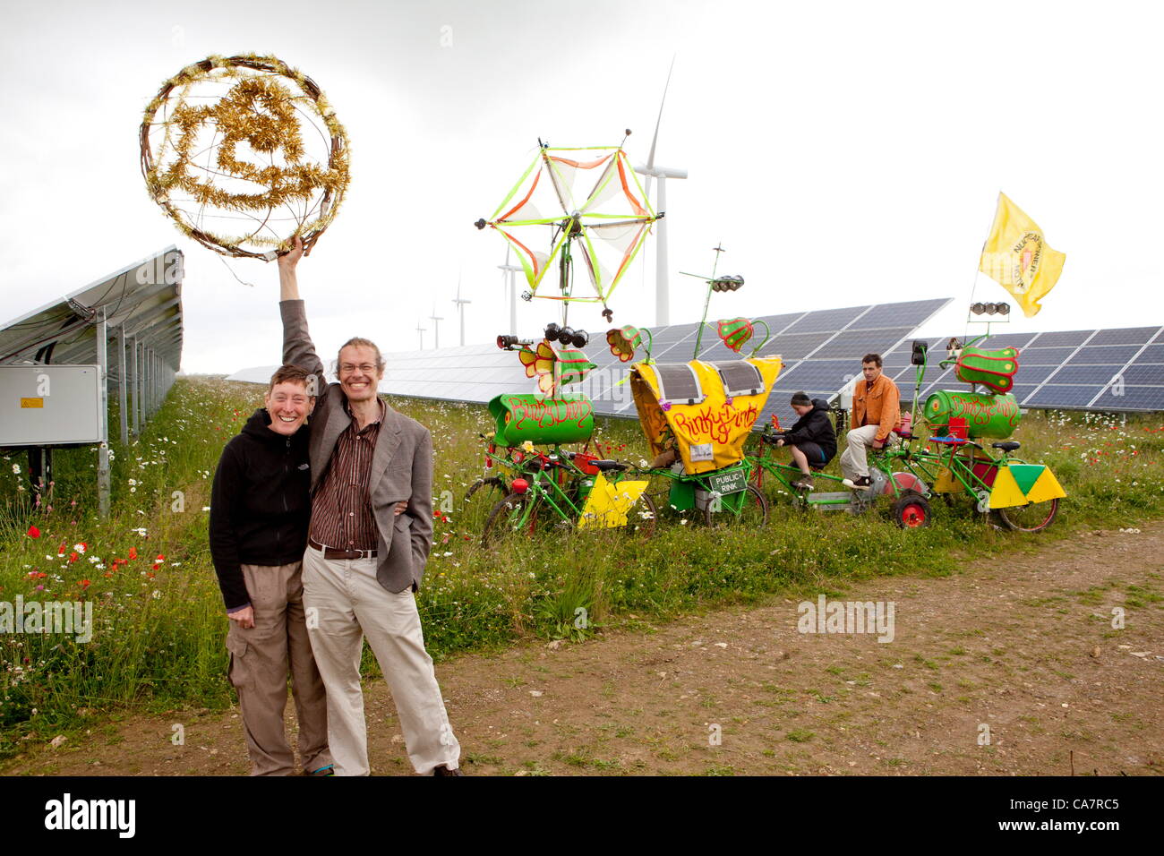 Wind turbine solar panel flower field hi-res stock photography and ...