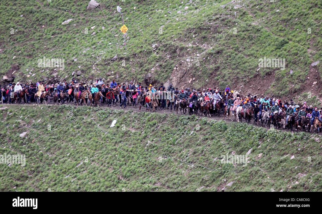 Hindu pilgrims trek to the Amarnath cave during a pilgrimage near ...
