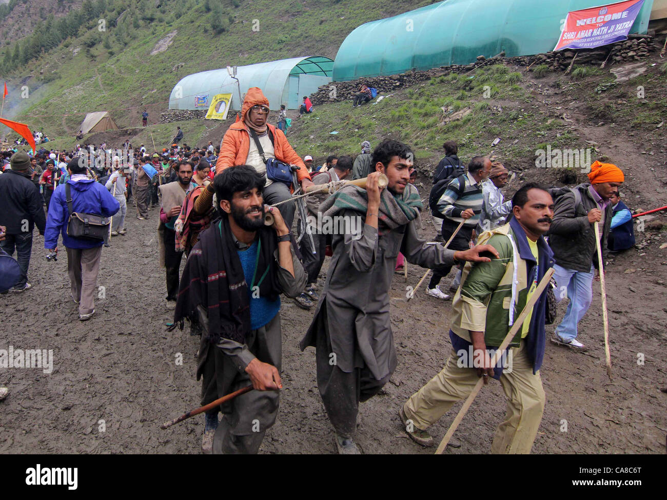 Hindu pilgrims trek to the Amarnath cave during a pilgrimage near ...