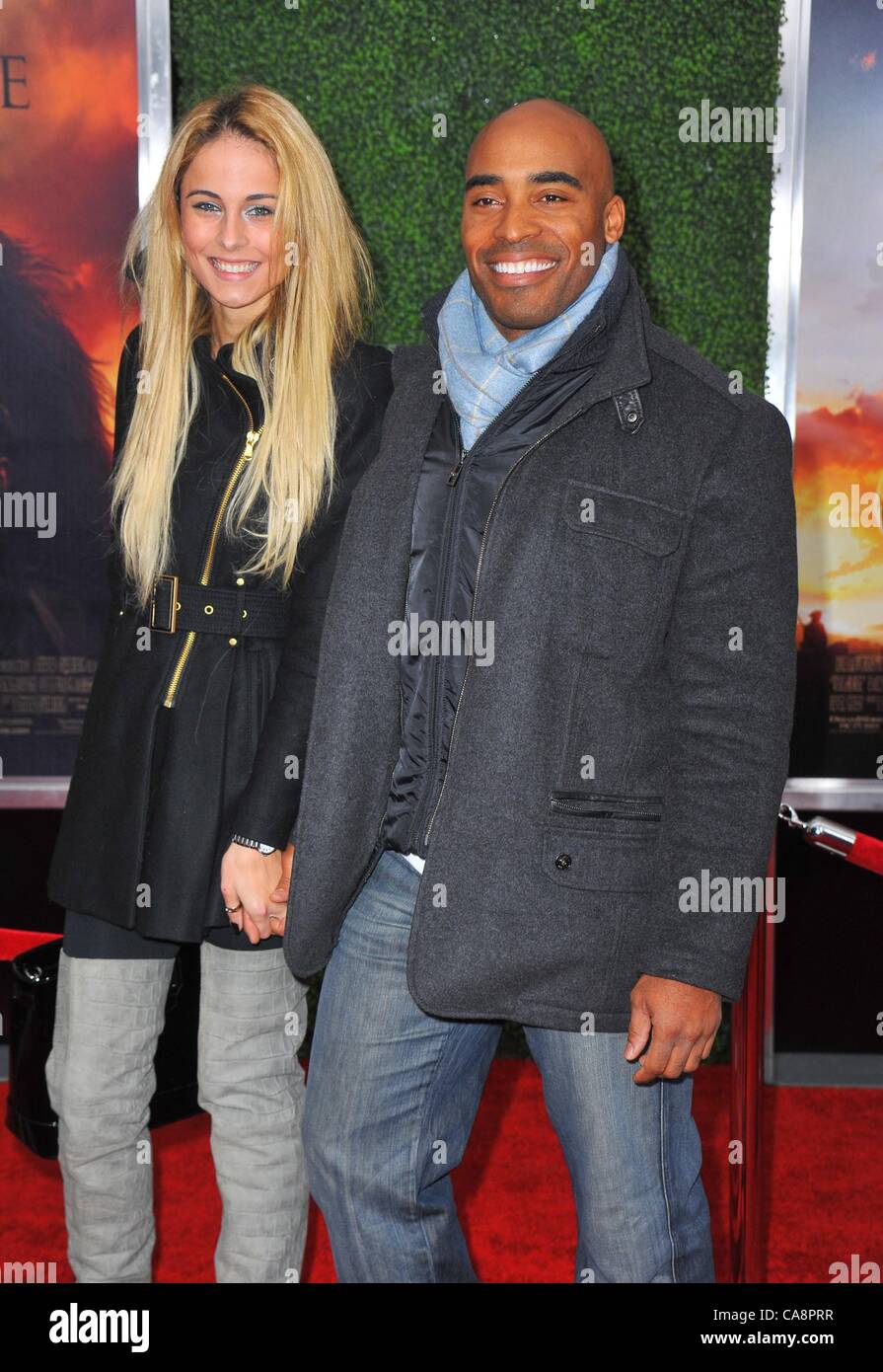 Traci Lynn Johnson, Tiki Barber at arrivals for WAR HORSE Premiere ...