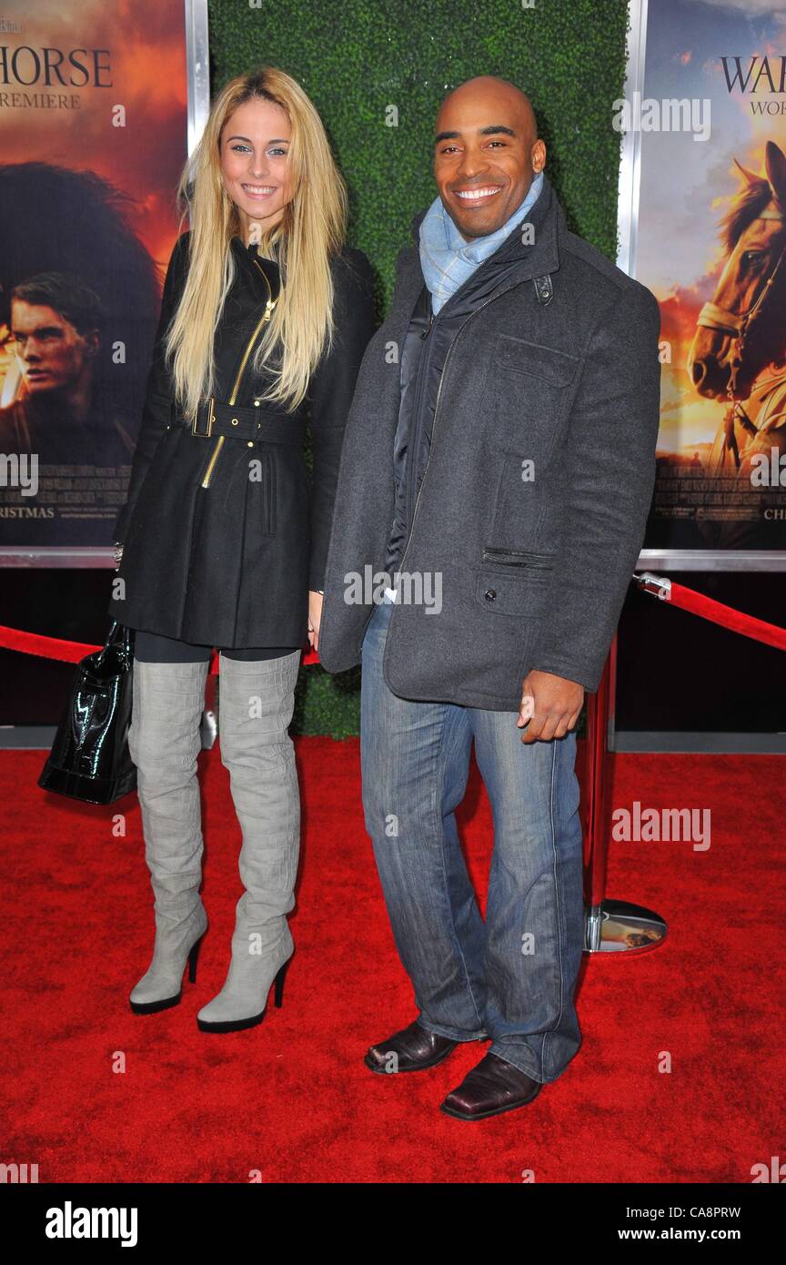 Traci Lynn Johnson, Tiki Barber at arrivals for WAR HORSE Premiere ...