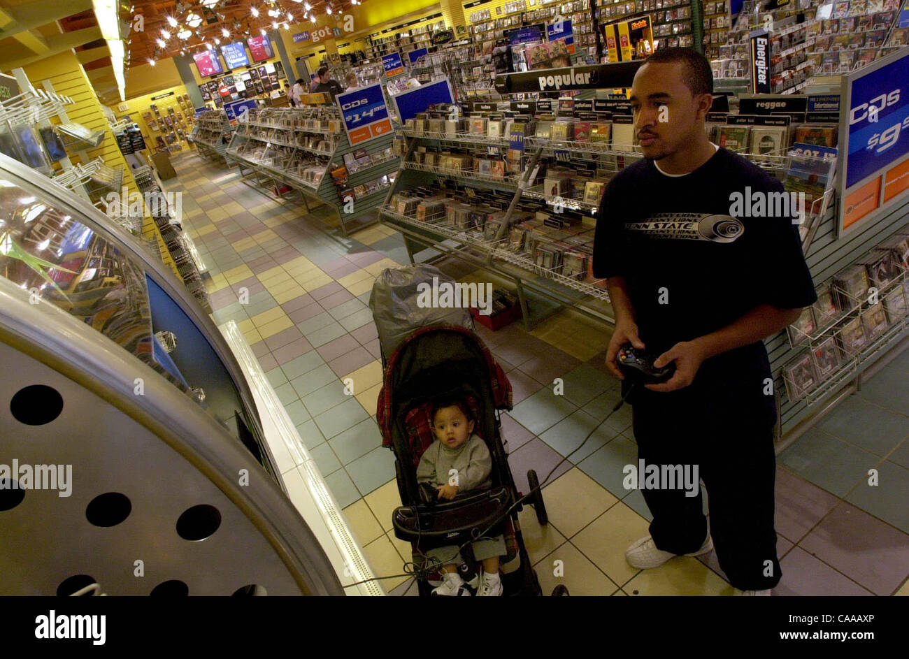 (Published 01/10/2003, C-1) Michael Netherly Jr. right,and son Marcus ...