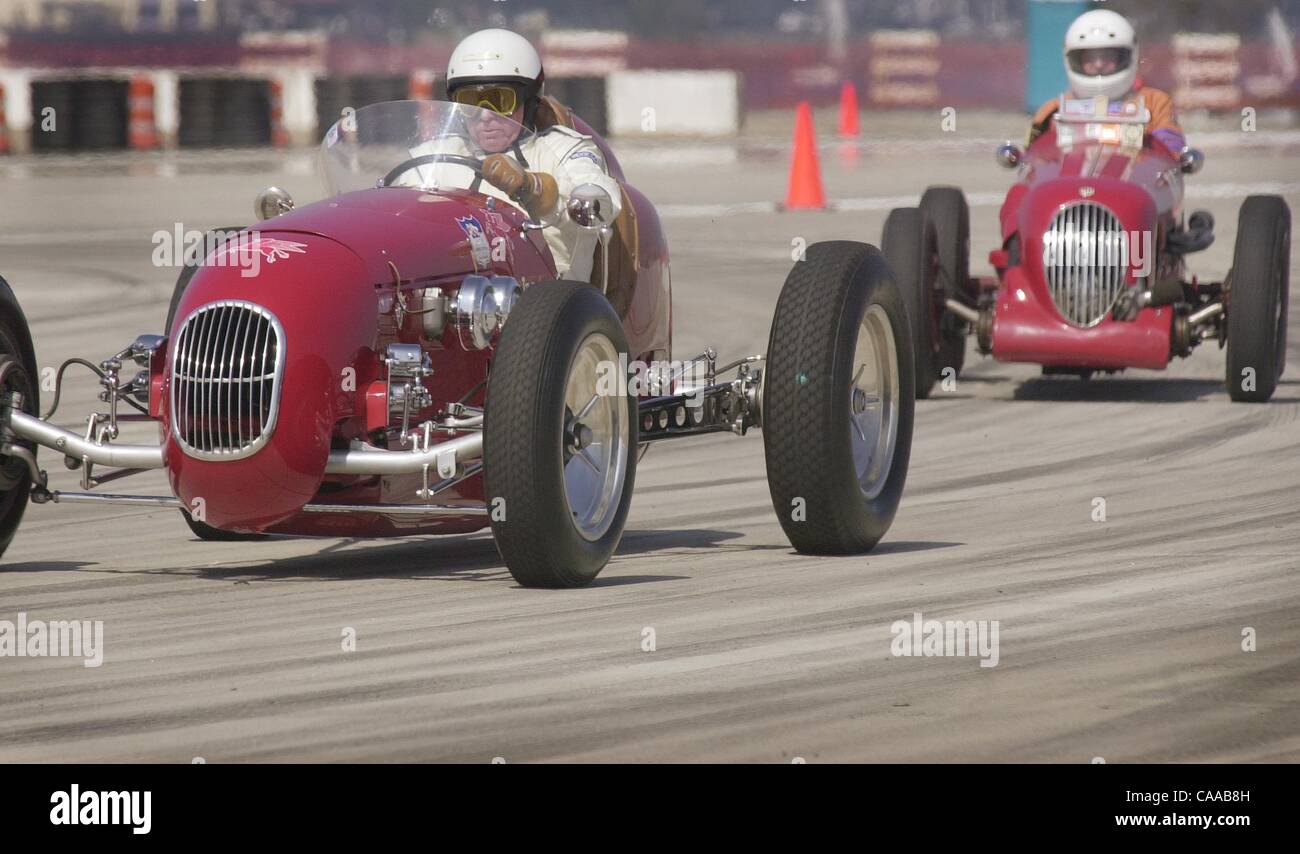 (PUBLISHED 10/10/2004, B-1) Tom Malloy takes a corner in his 1948 ...