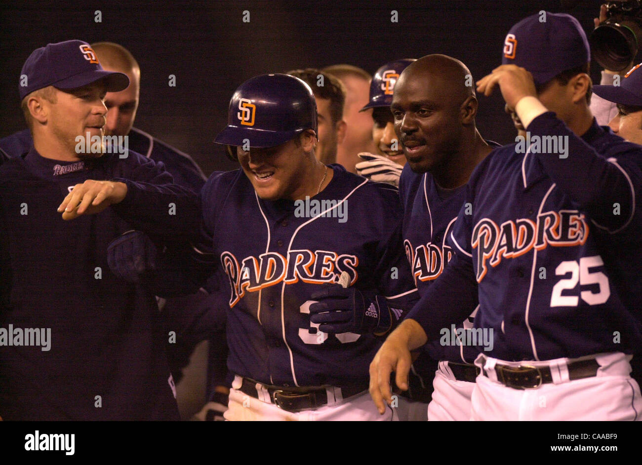 (Published 05/03/2003, D-12) Padres Sean Burroughs is mobbed by ...