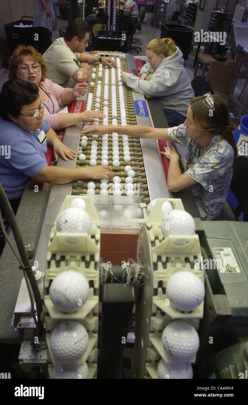 (PUBLISHED 04/17/2004, C-1, UTS1802064) Workers on the inspection line ...