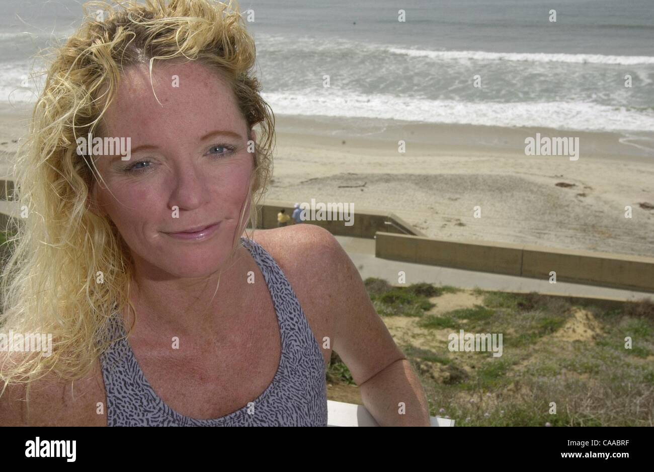 (Published 03/28/2004, C-2, UTS1797770) Lisa Roche stands near the ...