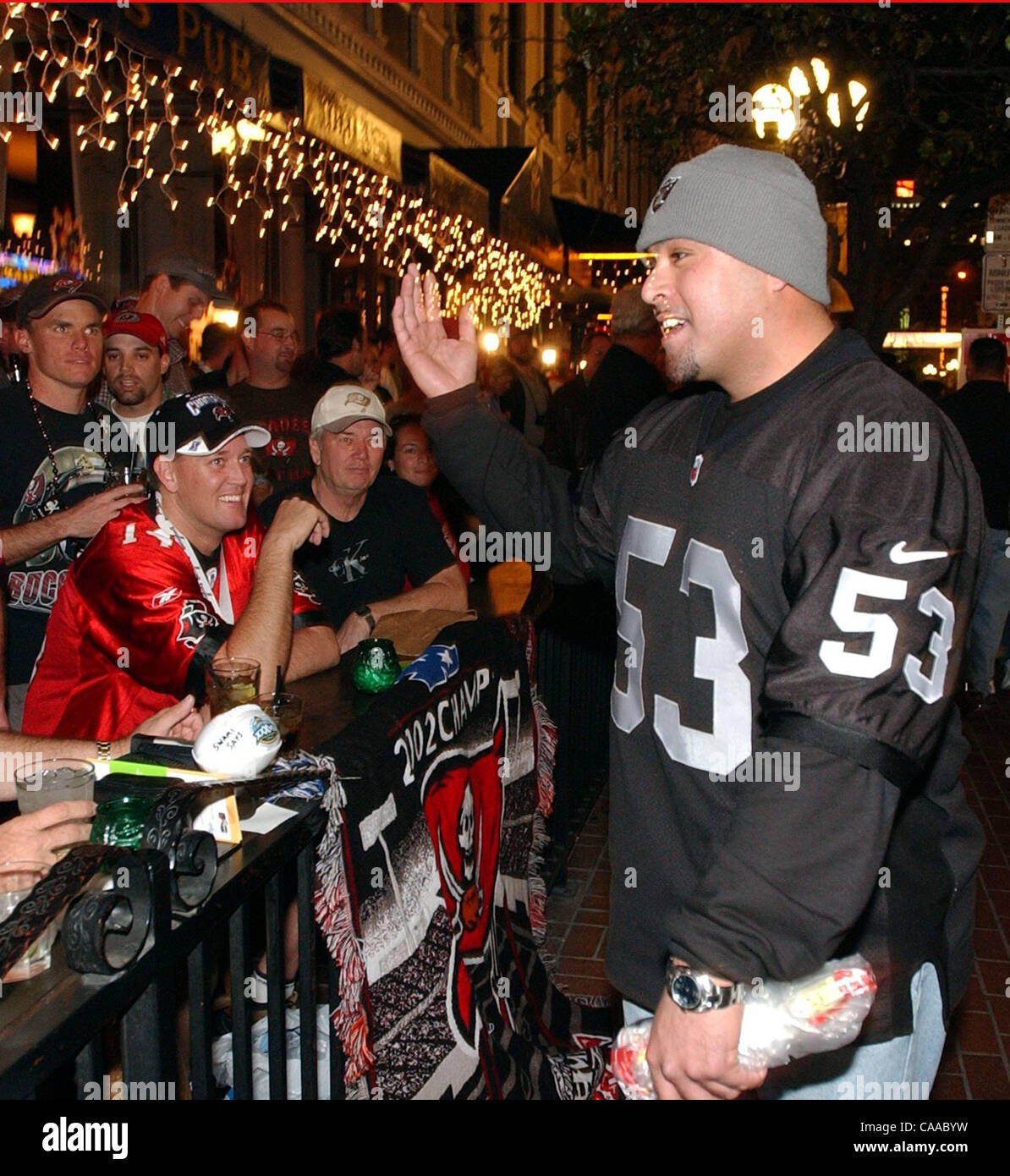 Tampa Bay and Oakland fans rib each other along San Diego's party ...