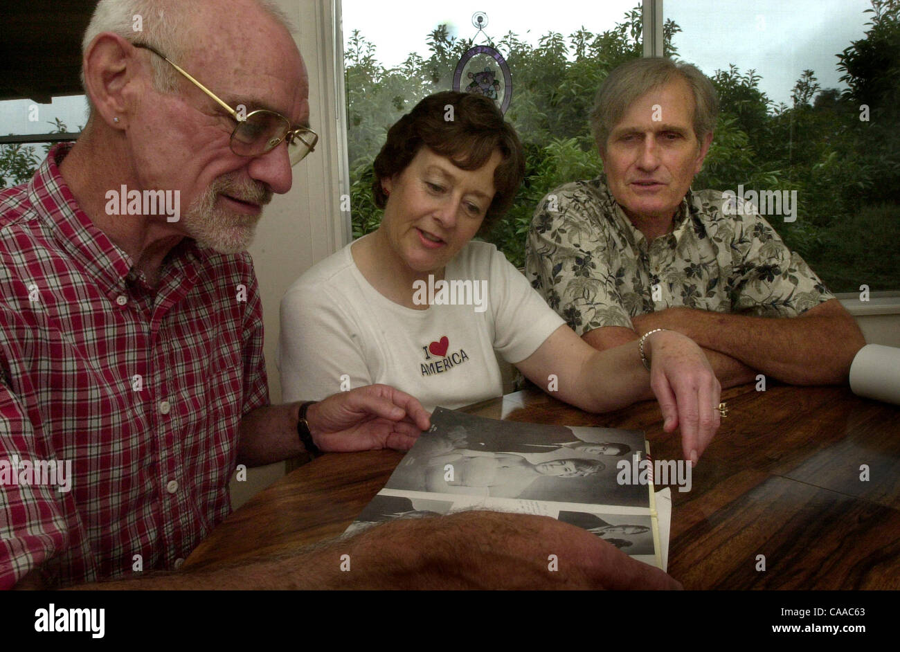 (Published 06/25/2003, NC-7, NI-6): Bill Hansen (left) looks at 1963 ...
