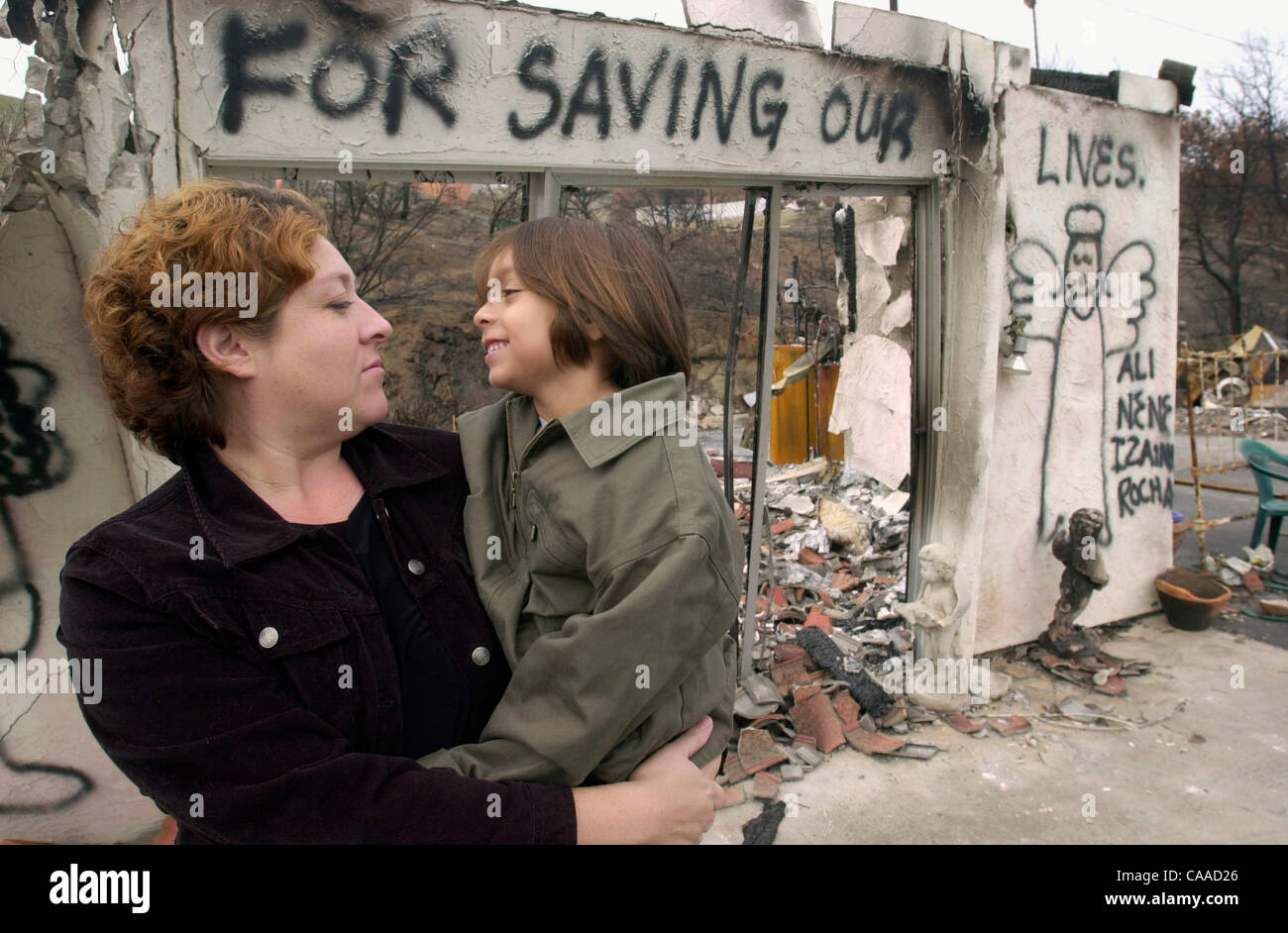 (Published 11/29/2003, NI-6) SLburned213911x001/Nov 21---Gloria Rocha ...