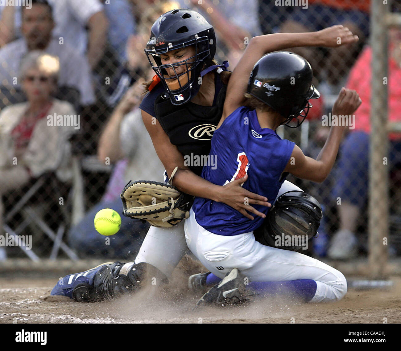 Valhalla catcher Kim Hayden, left, loses control of a ball thrown to ...