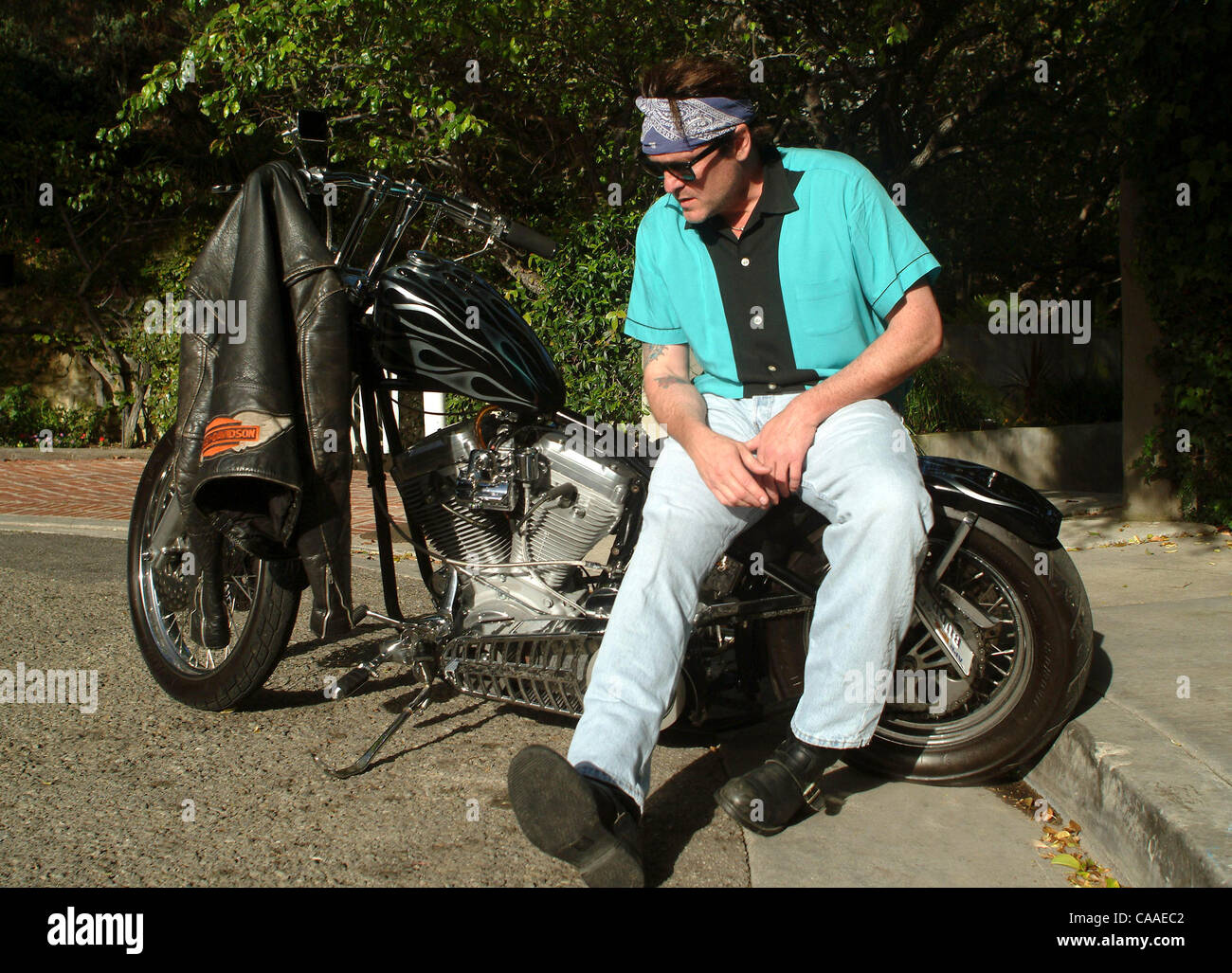 Mar 02, 2003; Malibu, CA, USA; Actor MICHAEL MADSEN with his motorcycle ...