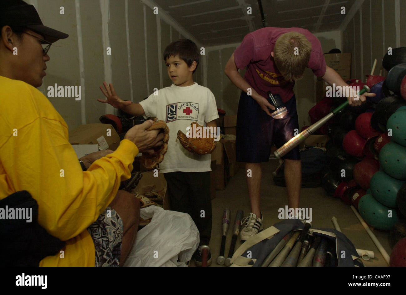 (PUBLISHED 02/10/2003, B-4): Young Jordan Wilson shows his dad John ...